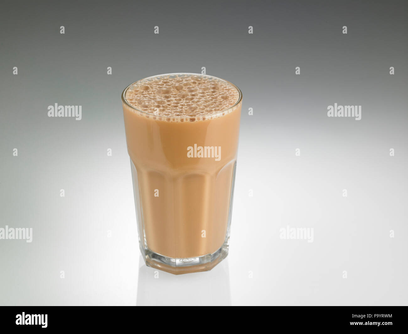 Big glass Tea with milk or Teh Tarik in Malaysia Stock Photo - Alamy
