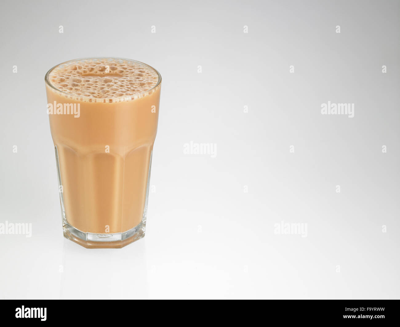 Big glass Tea with milk or Teh Tarik in Malaysia Stock Photo - Alamy