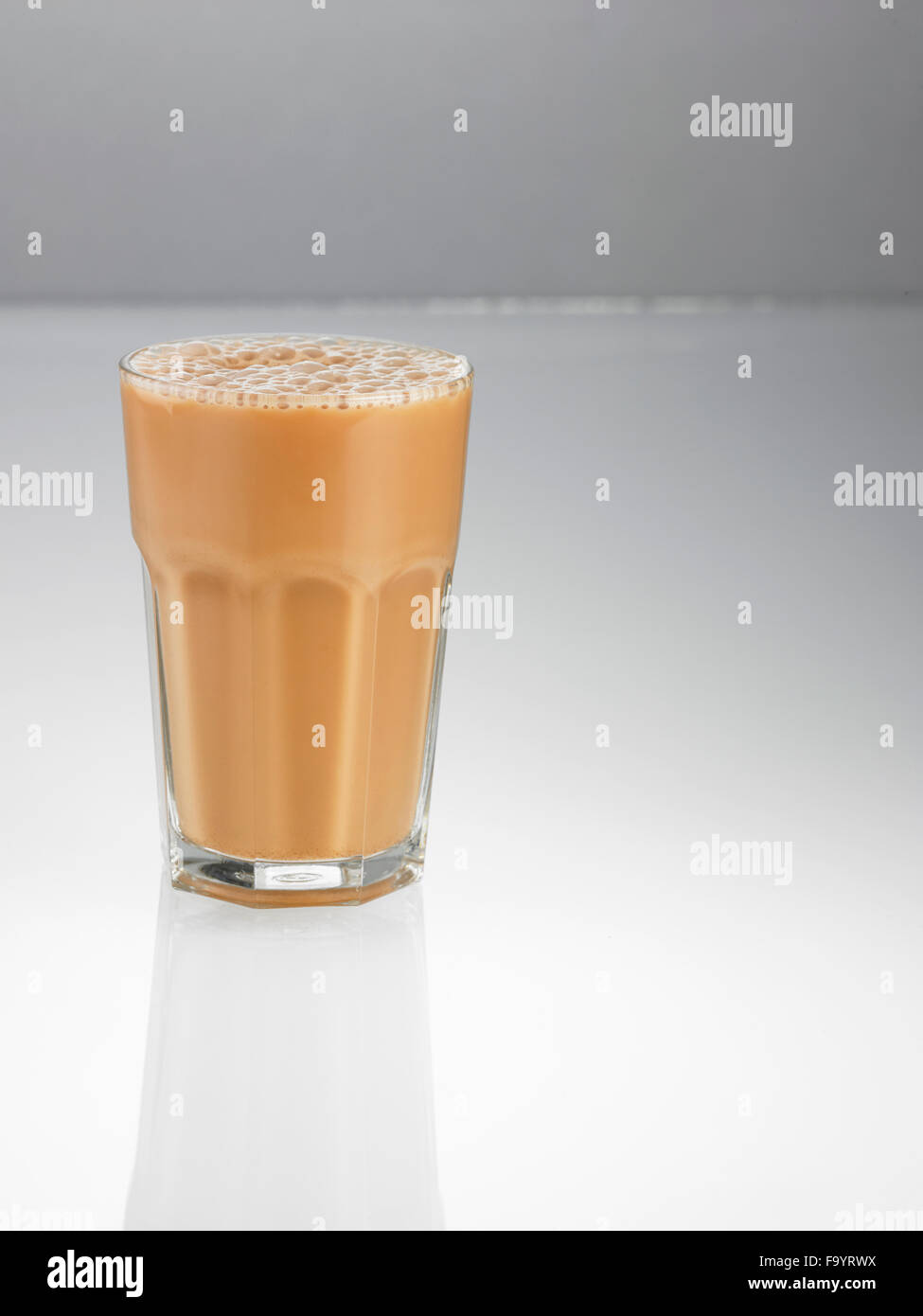 Big glass Tea with milk or Teh Tarik in Malaysia Stock Photo - Alamy