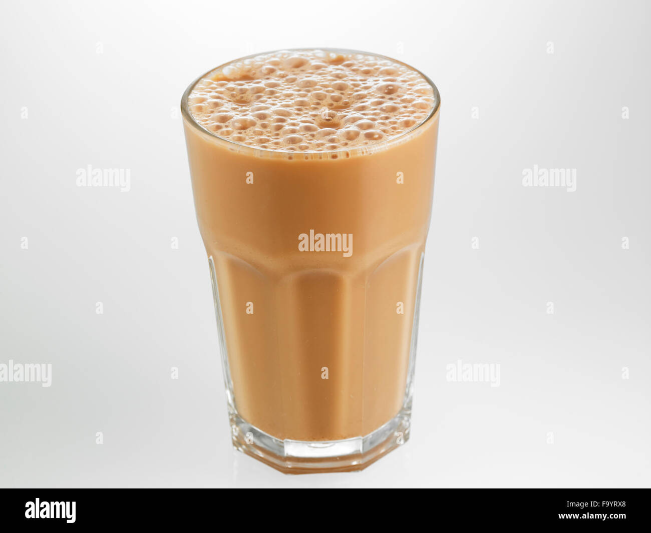 Big glass Tea with milk or Teh Tarik in Malaysia Stock Photo - Alamy