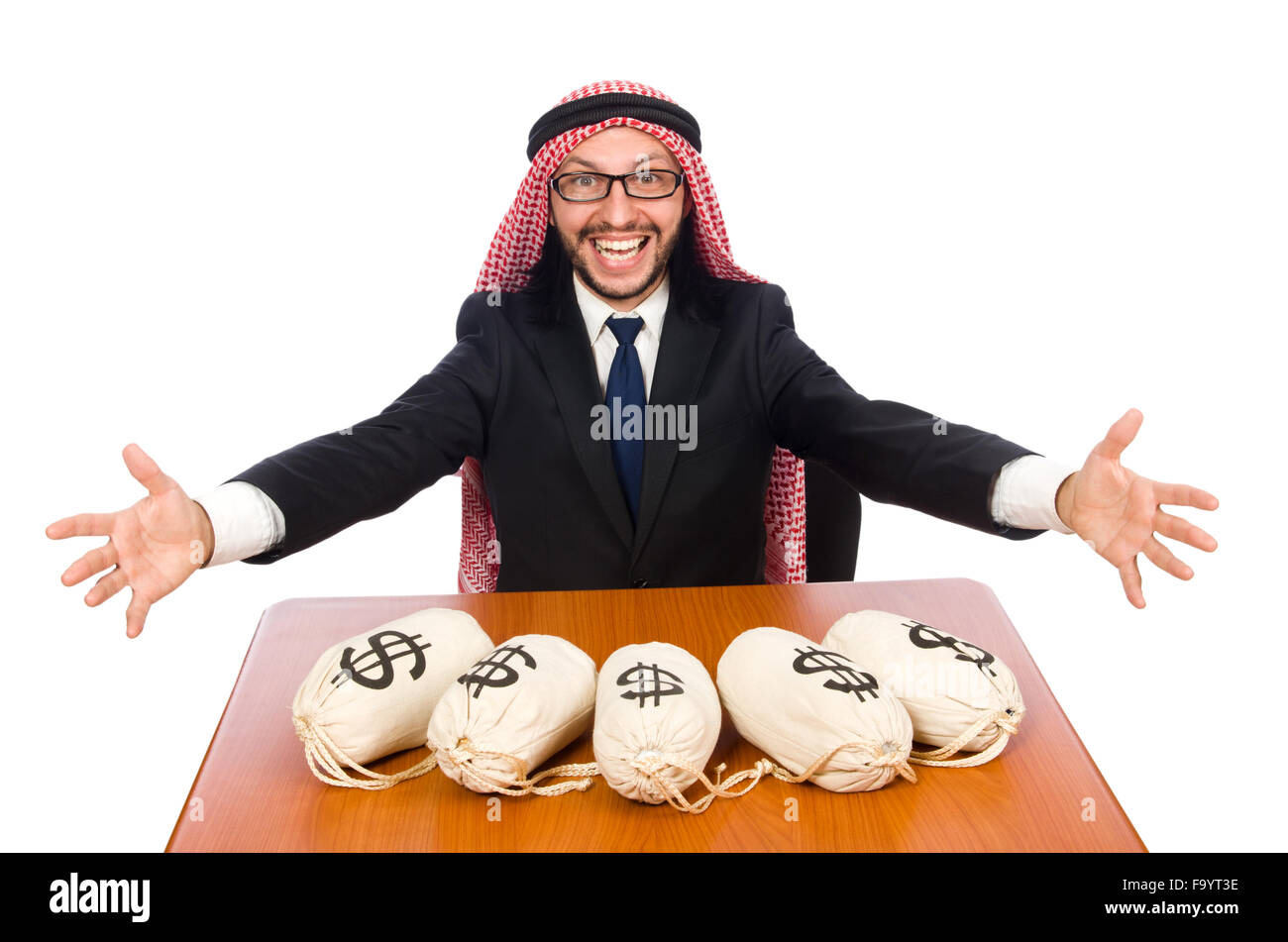 Arab businessman with sacks of money Stock Photo - Alamy