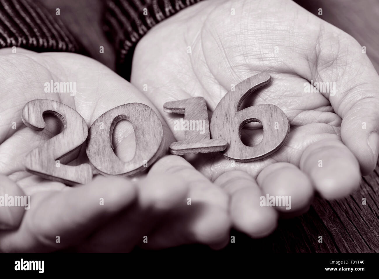 closeup of wooden numbers forming the number 2016, as the new year, in ...
