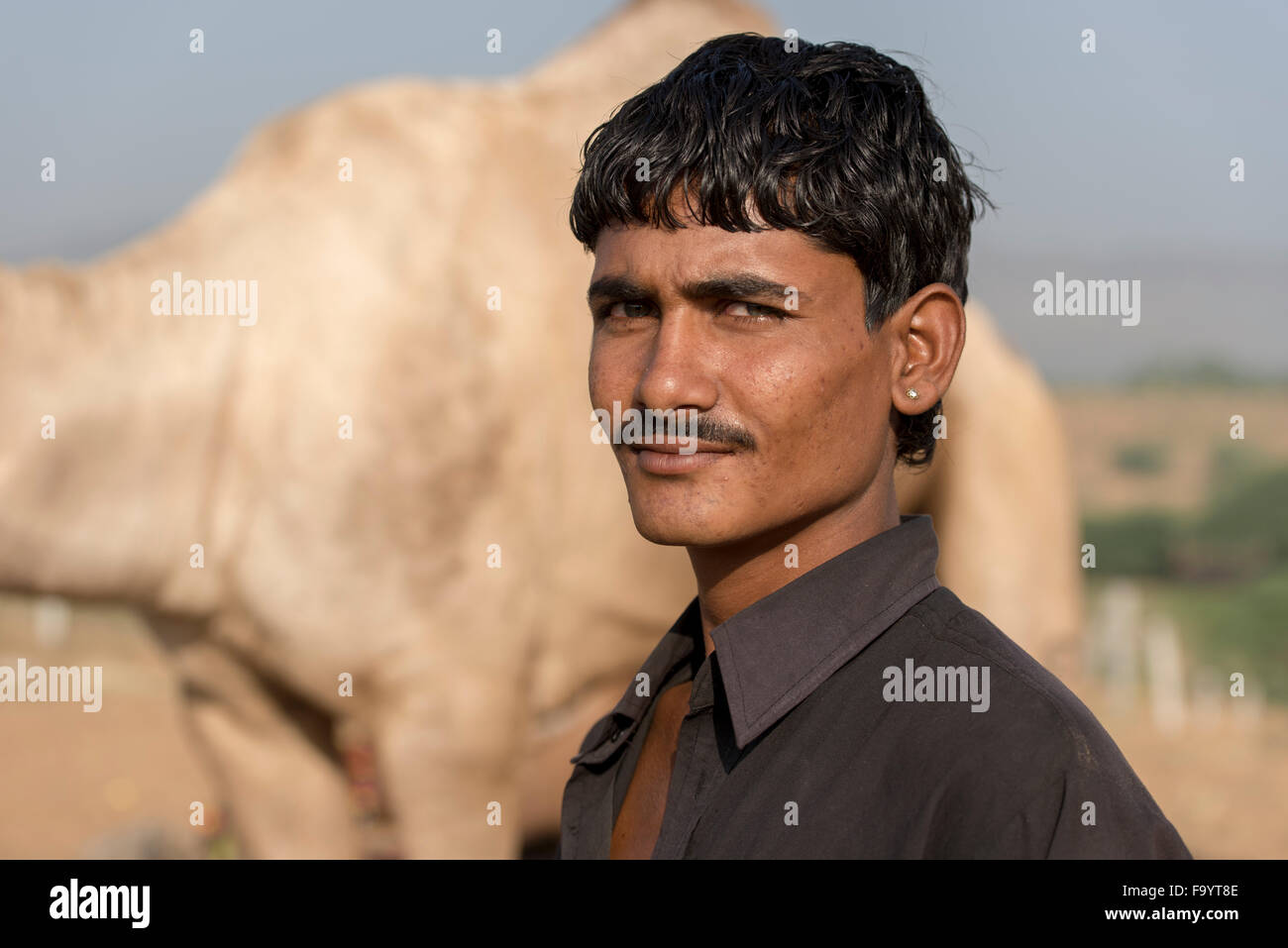 Camel owner fair pushkar hi-res stock photography and images - Alamy