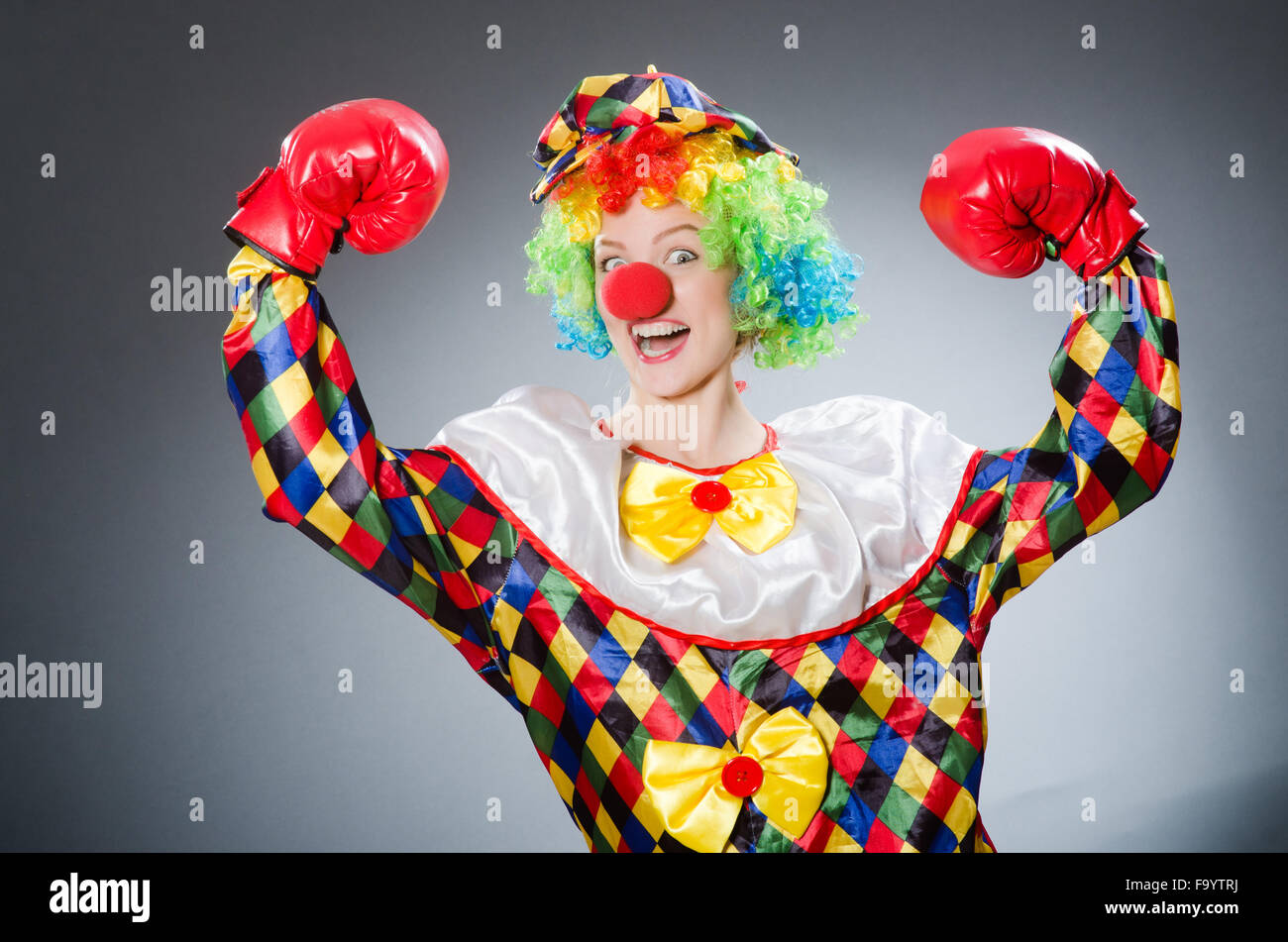 Funny clown with boxing gloves Stock Photo - Alamy
