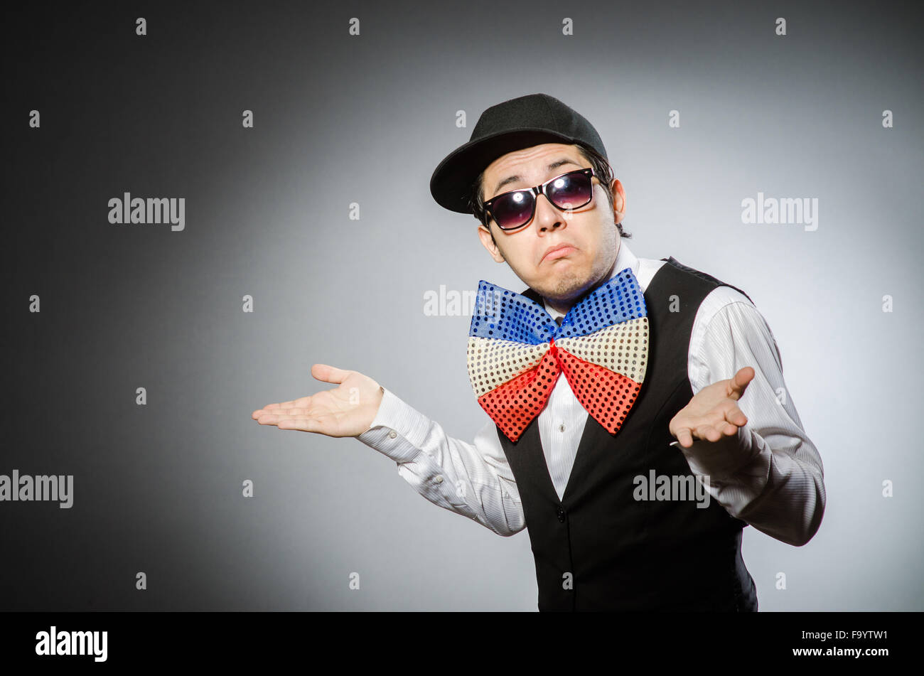 Funny man with giant bow tie Stock Photo - Alamy