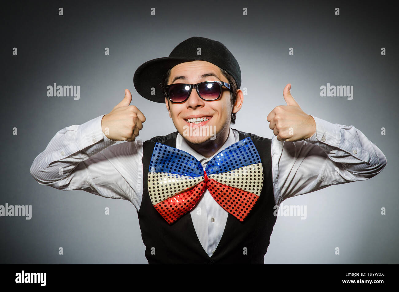 Funny man with giant bow tie Stock Photo - Alamy