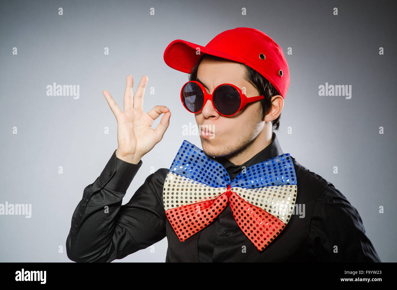 Funny man with giant bow tie Stock Photo - Alamy