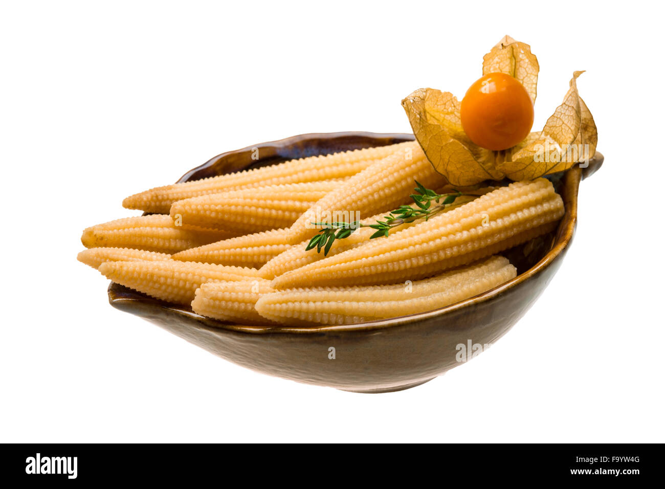 Baby corn with thyme Stock Photo - Alamy