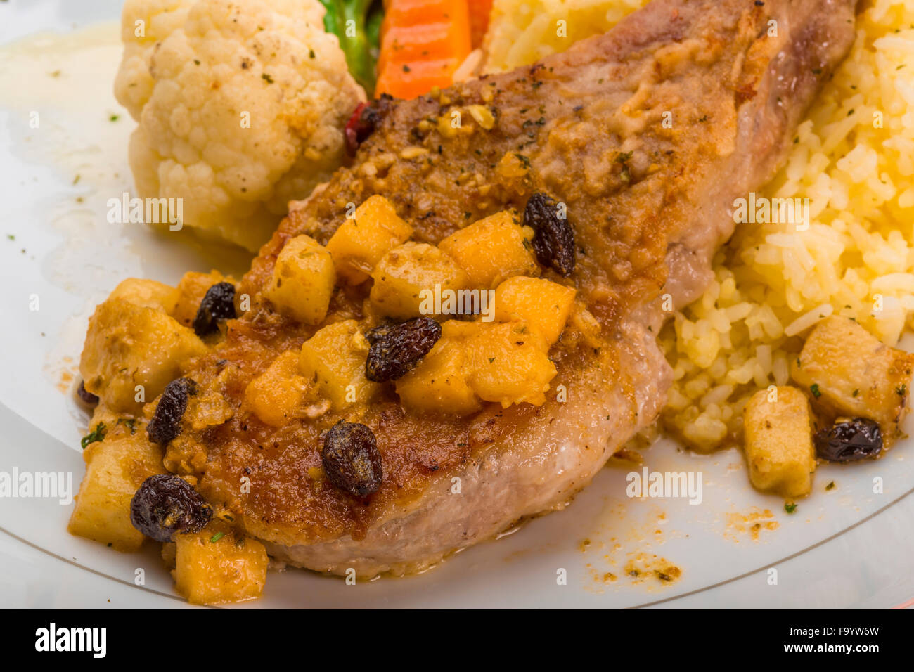 Pork t-bone steak with rice Stock Photo - Alamy
