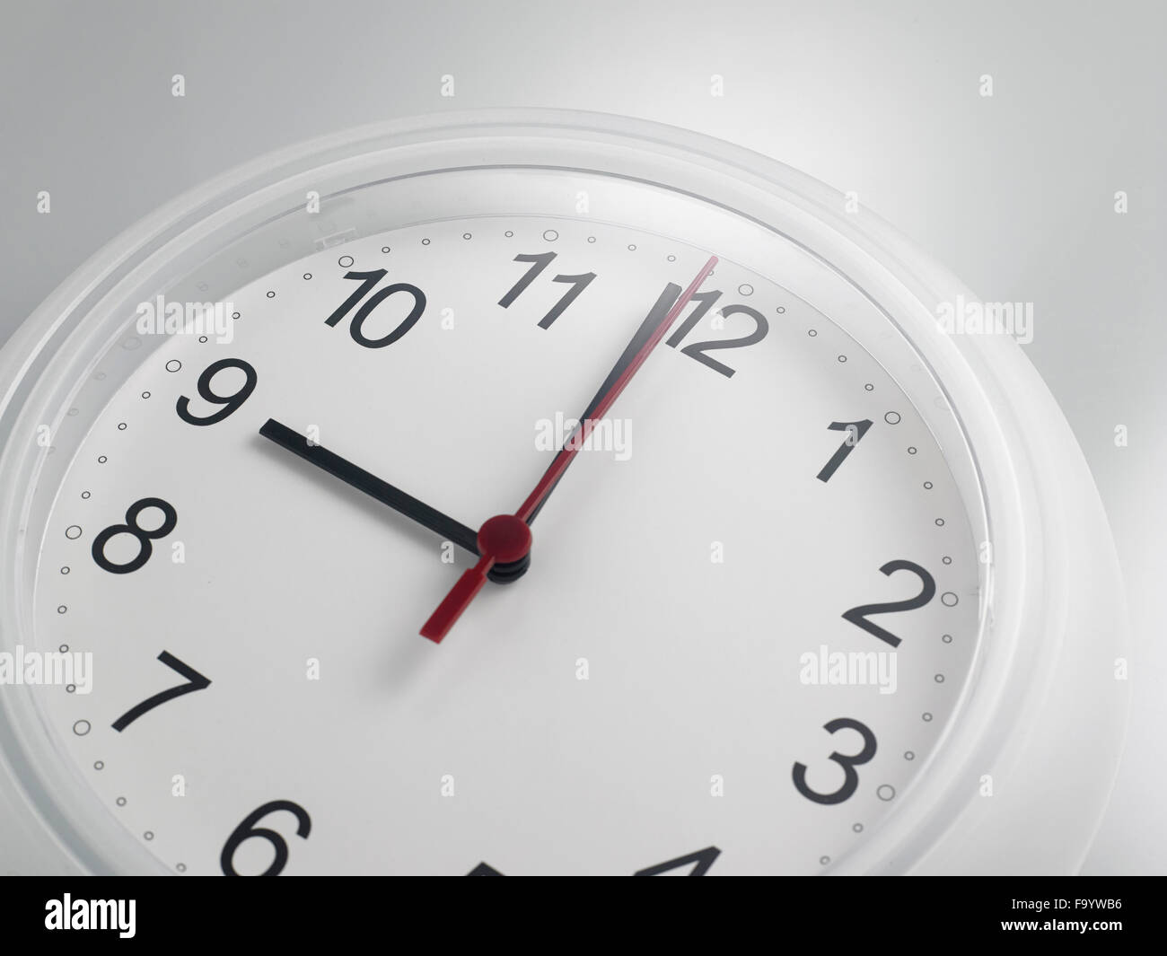 Close up of an analog clock at 9 o'clock Stock Photo - Alamy