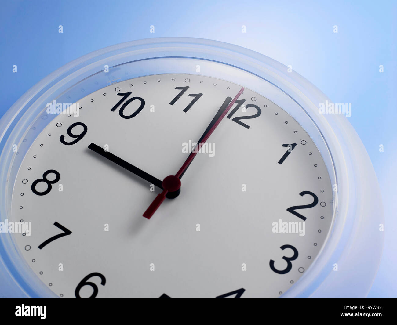 Close up of an analog clock at 9 o'clock Stock Photo - Alamy