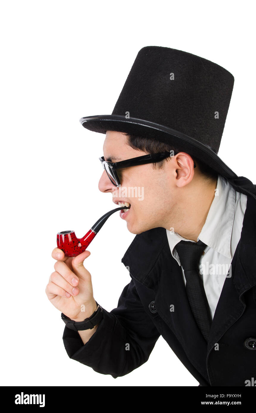 Young detective in black coat holding smoking pipe isolated on white ...