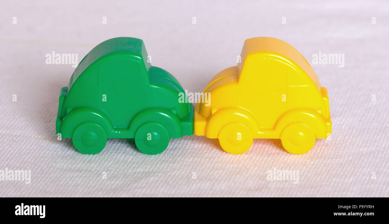 Toy cars in a row isolated on white background, accident Stock Photo ...
