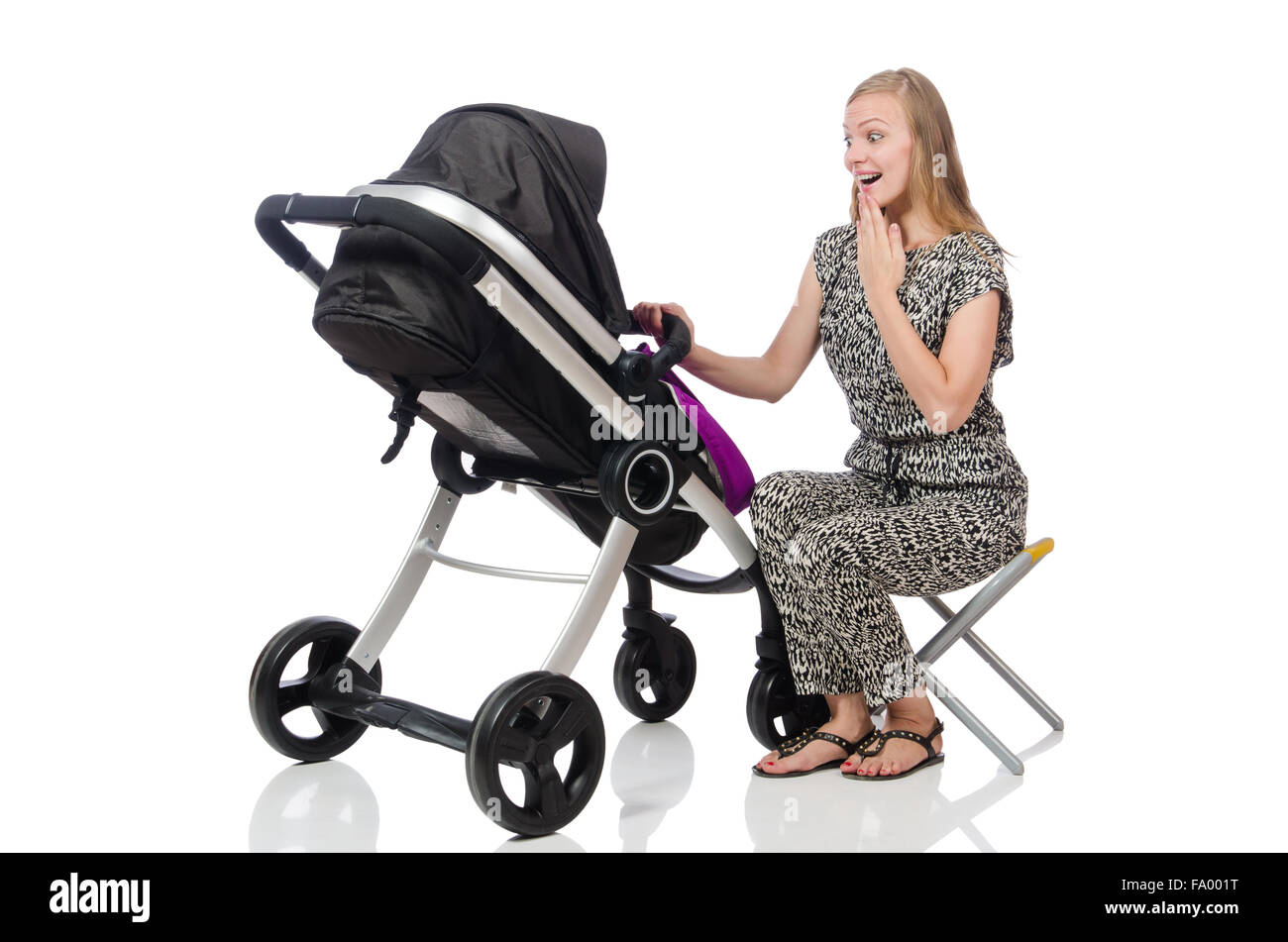 Happy mom with her baby in pram Stock Photo - Alamy