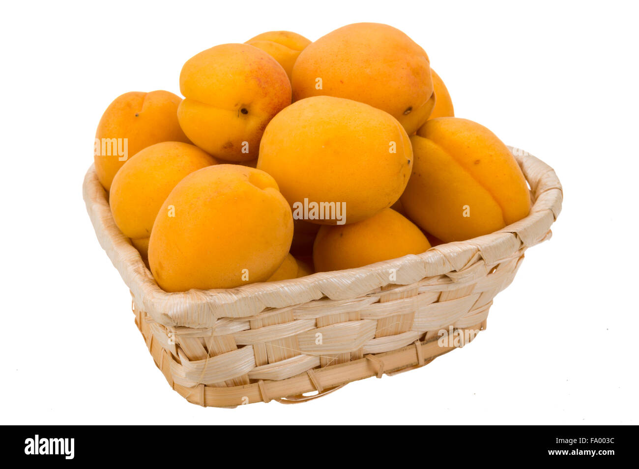 Yellow bright apricots isolated on white Stock Photo - Alamy