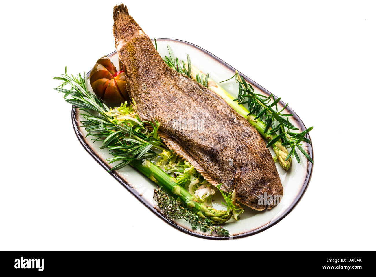 Fish Dover sole roasted Stock Photo - Alamy