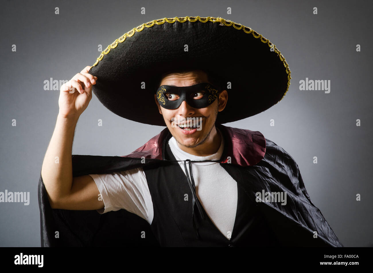 Person wearing sombrero hat in funny concept Stock Photo - Alamy