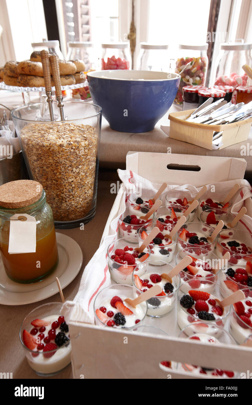 Hotel breakfast table with Lightweight meals and fruits Stock Photo - Alamy