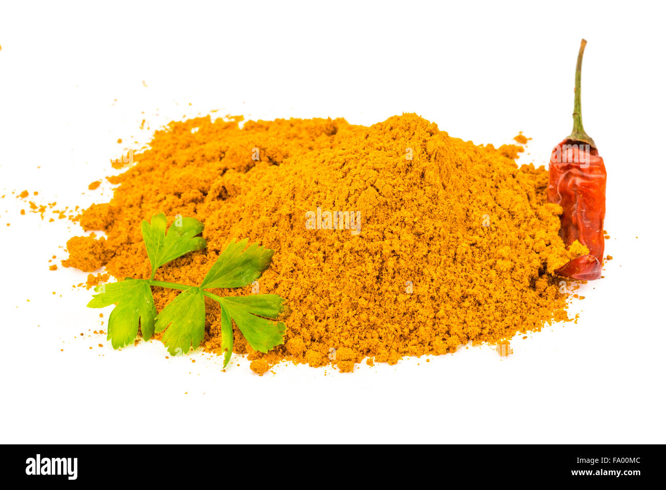 Curcuma powder heap isolated Stock Photo - Alamy