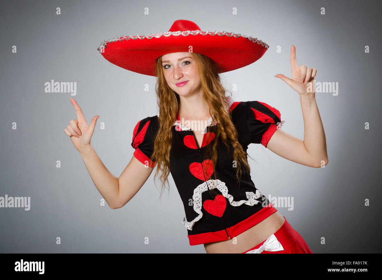 Mexican woman wearing sombrero hat Stock Photo - Alamy