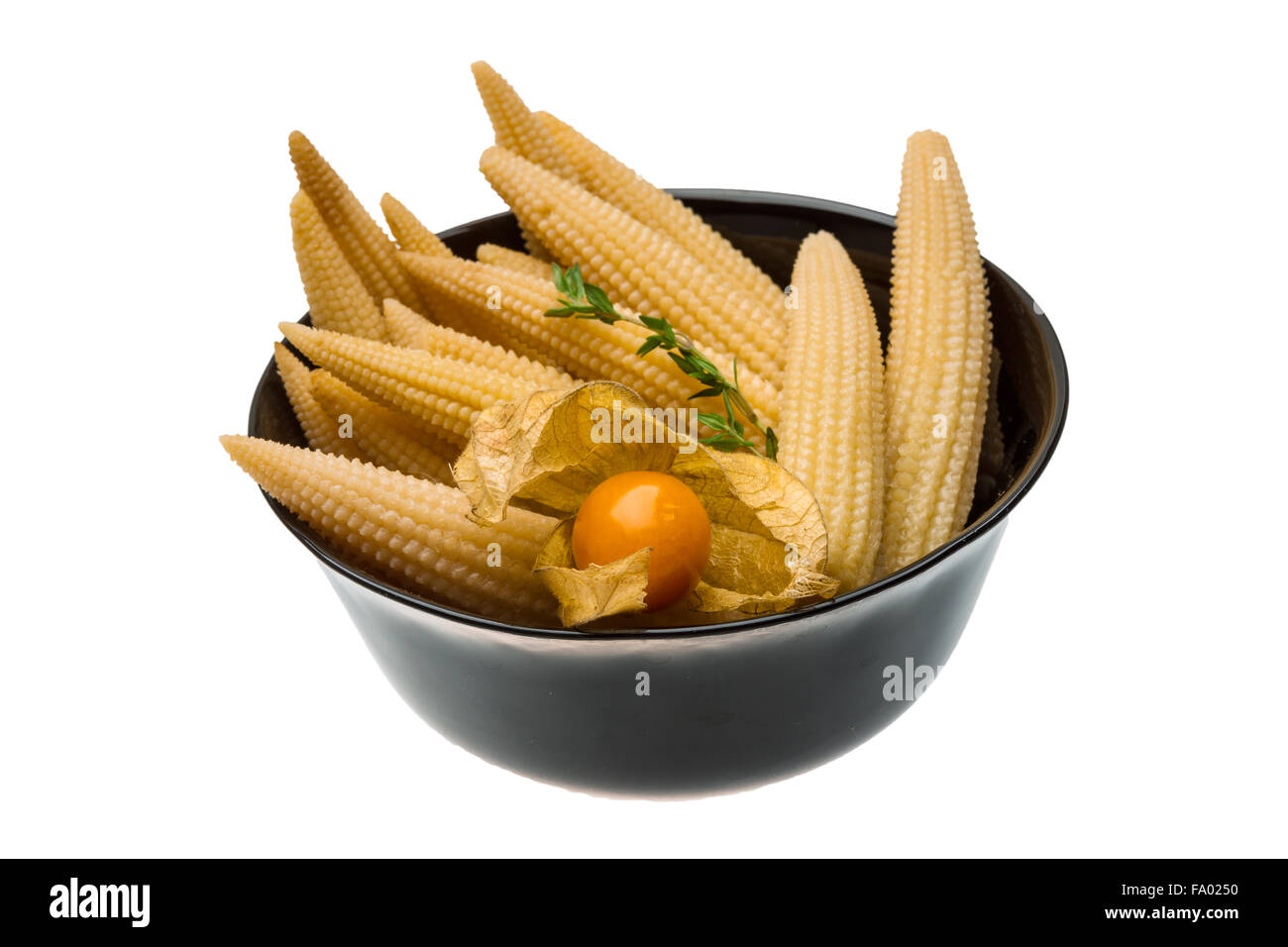 Baby corn with thyme Stock Photo - Alamy