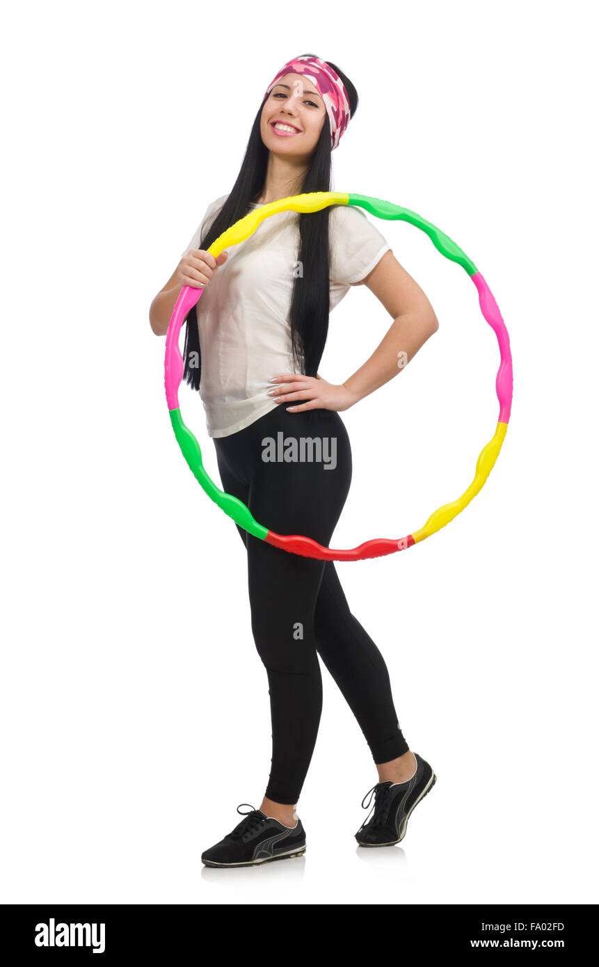 A girl in sport suit with hula hoop isolated on white Stock Photo - Alamy