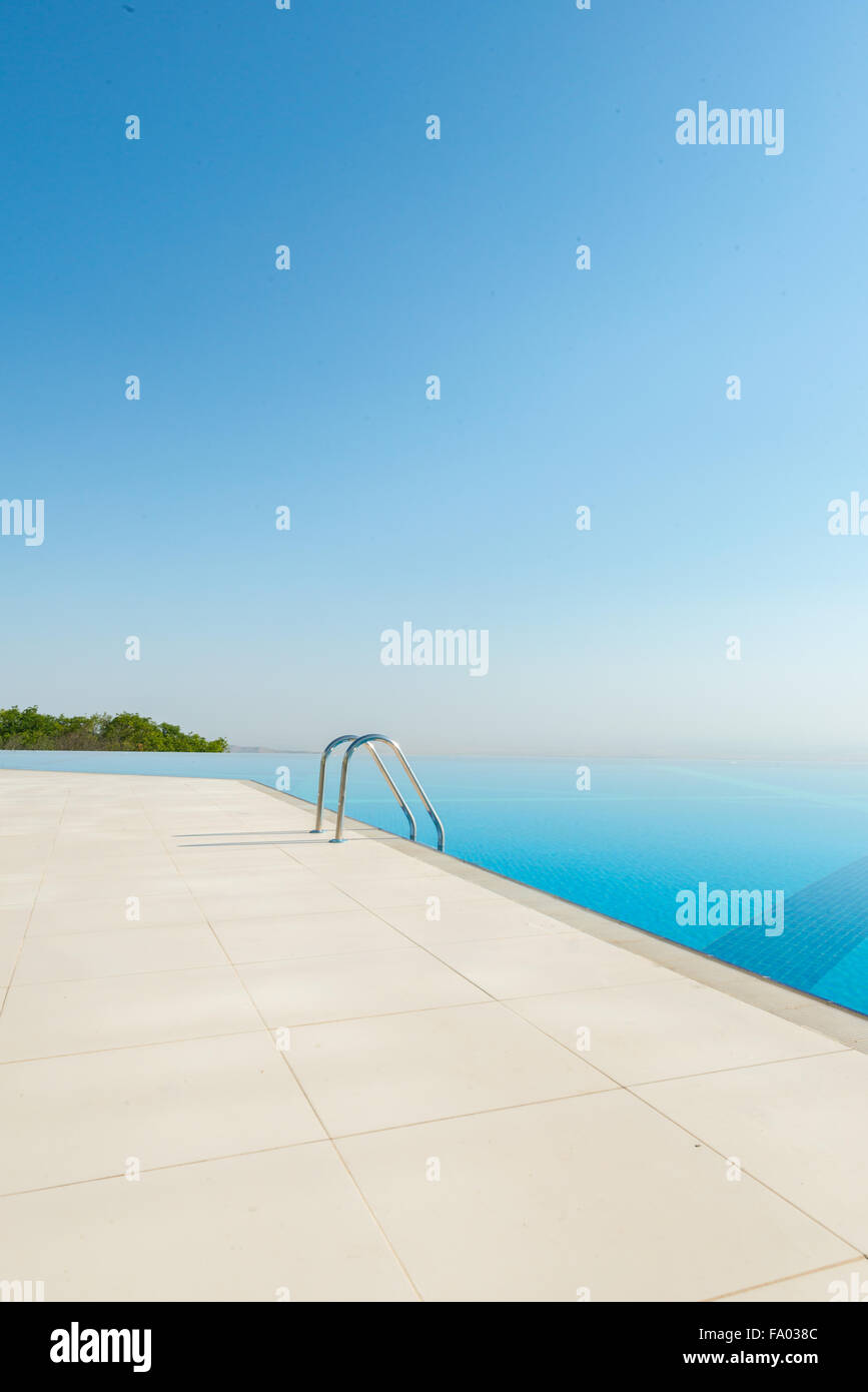 Infinity pool on the bright summer day Stock Photo - Alamy