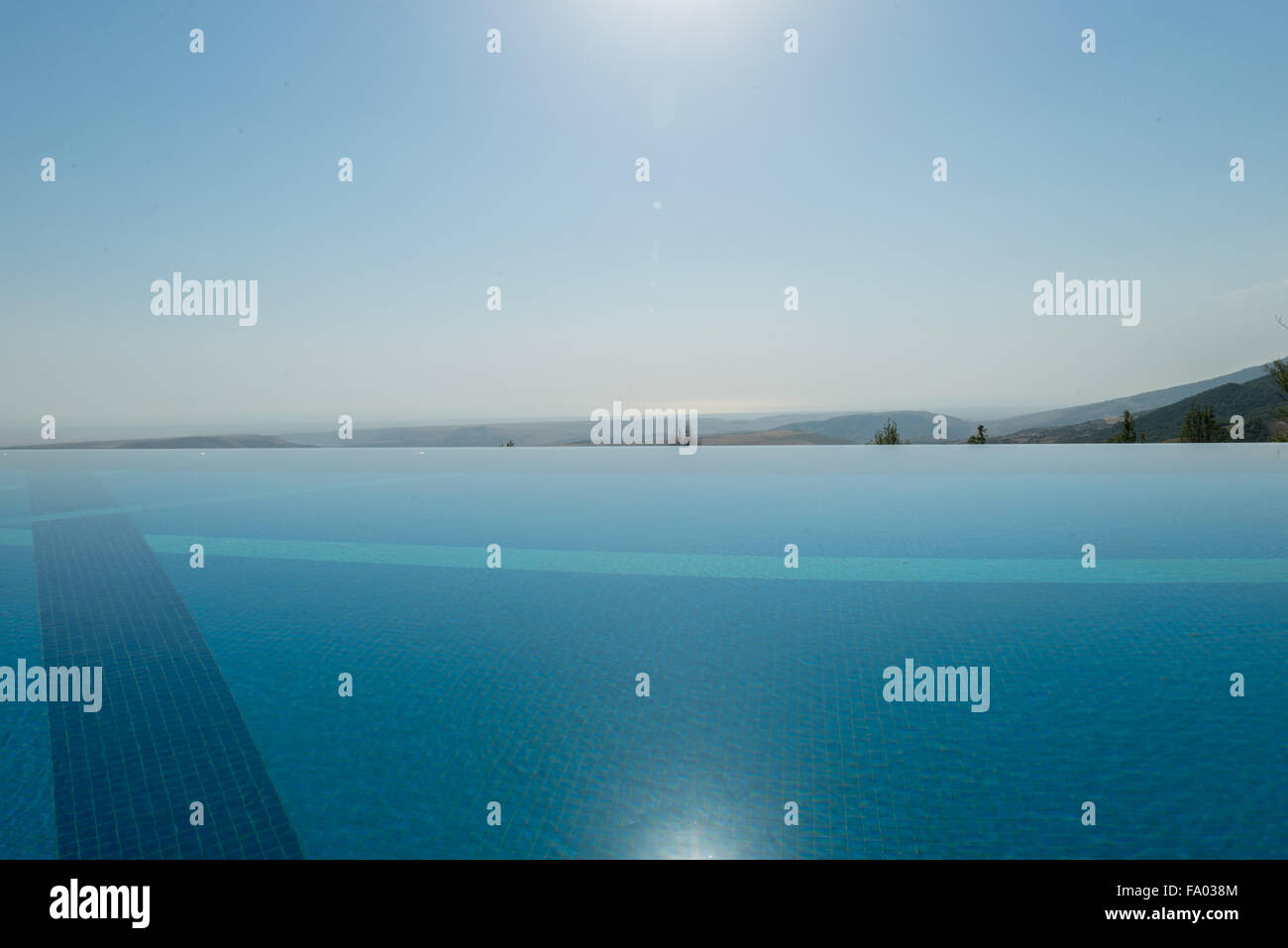 Infinity pool on the bright summer day Stock Photo - Alamy