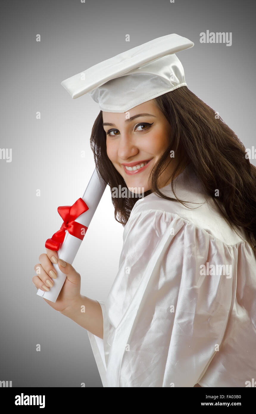 Happy student celebrating graduation on white Stock Photo - Alamy