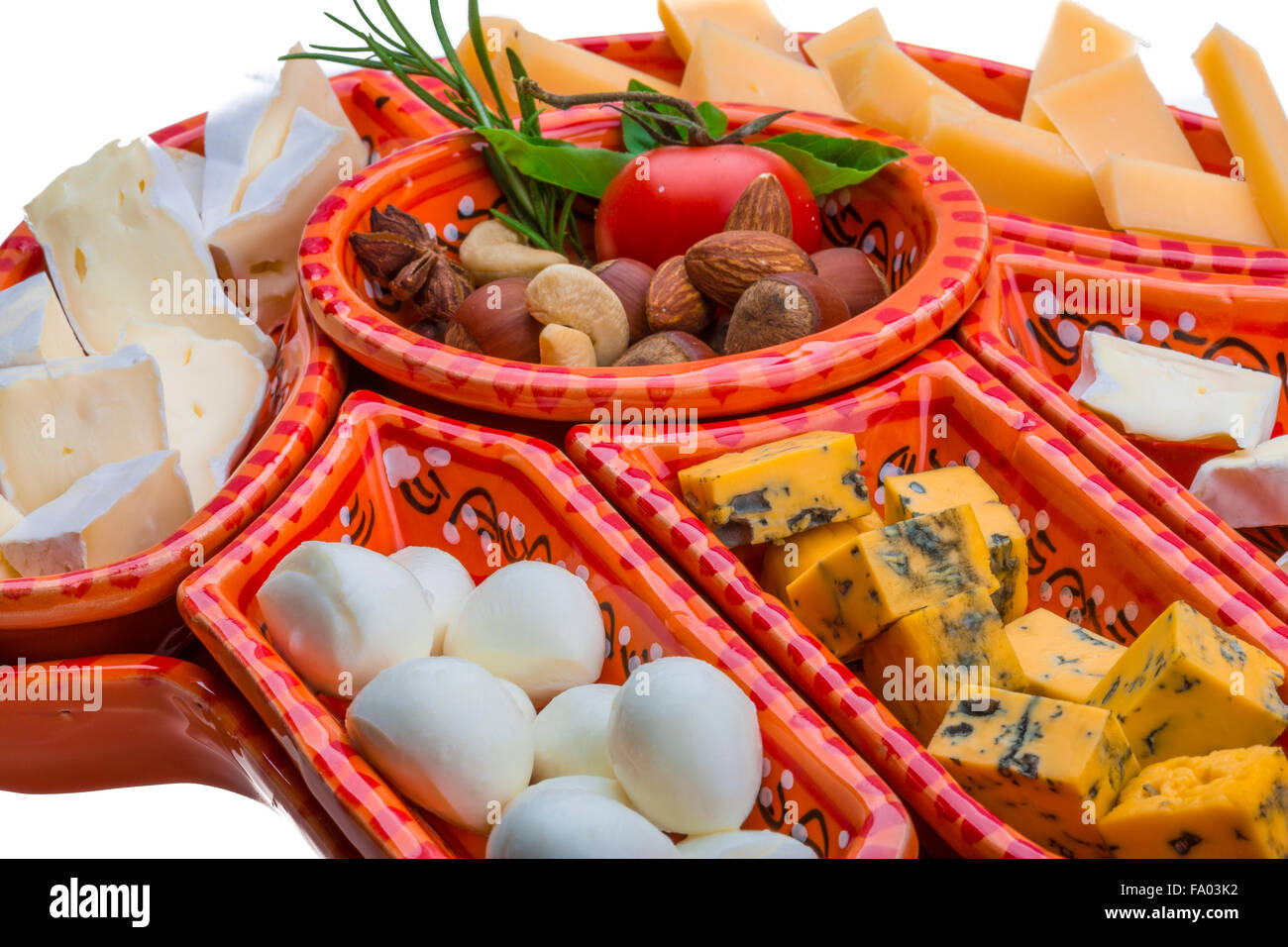 Variety cheese assortment with nuts and herbs Stock Photo - Alamy