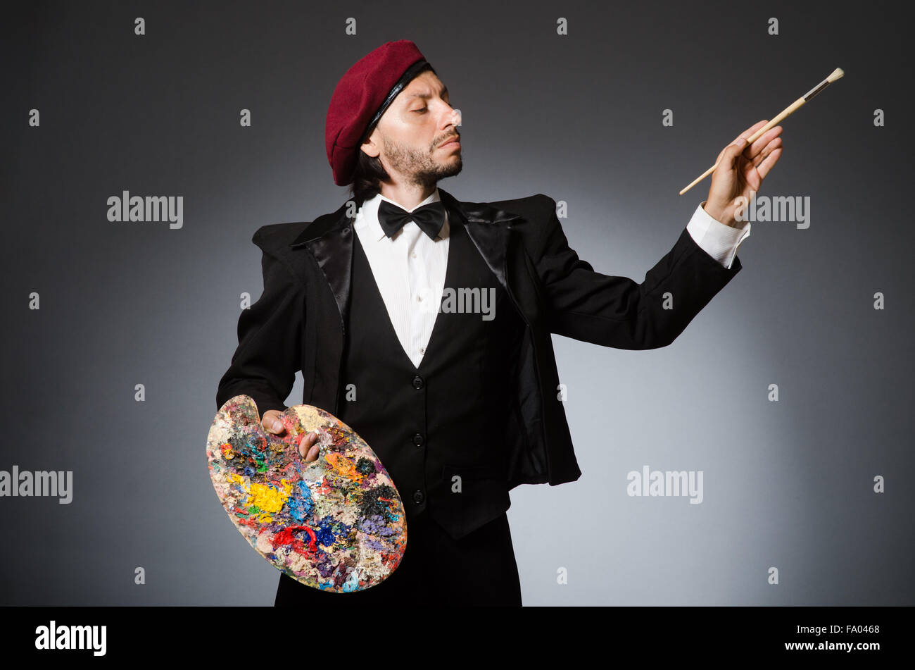 Funny artist working in the studio Stock Photo - Alamy