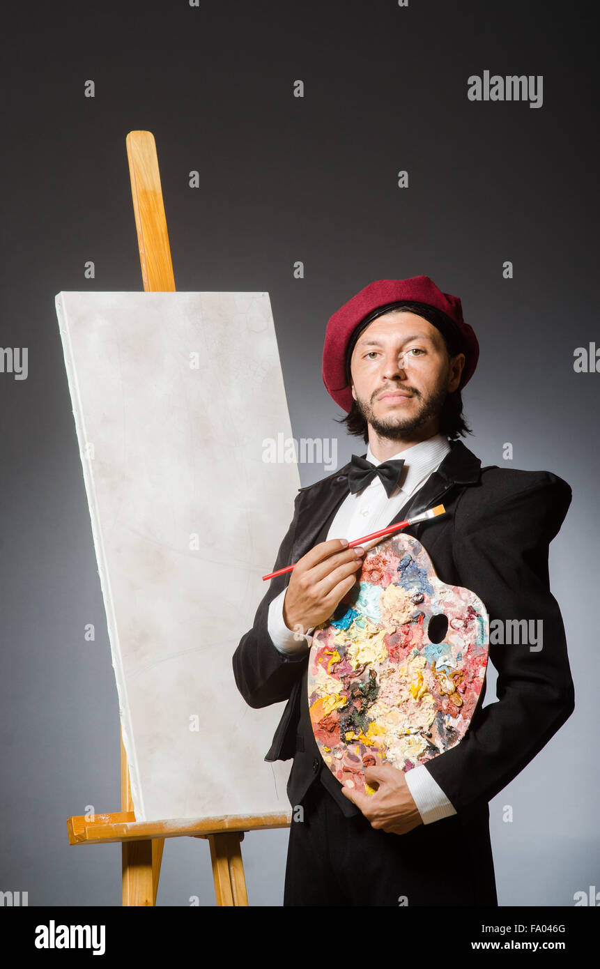 Funny artist working in the studio Stock Photo - Alamy