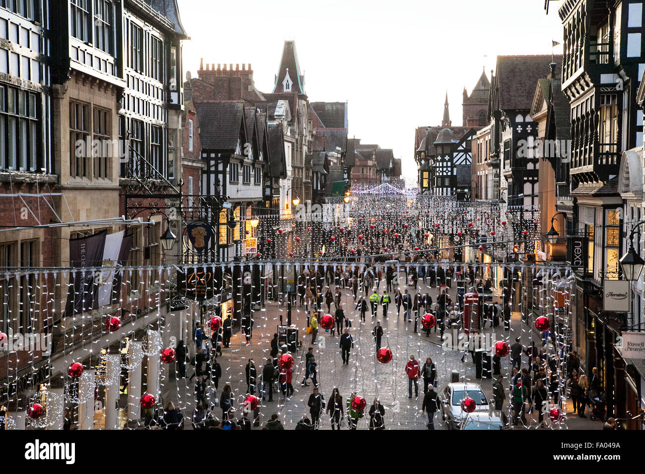 Street scene of Chester England with Christmas lights and people ...