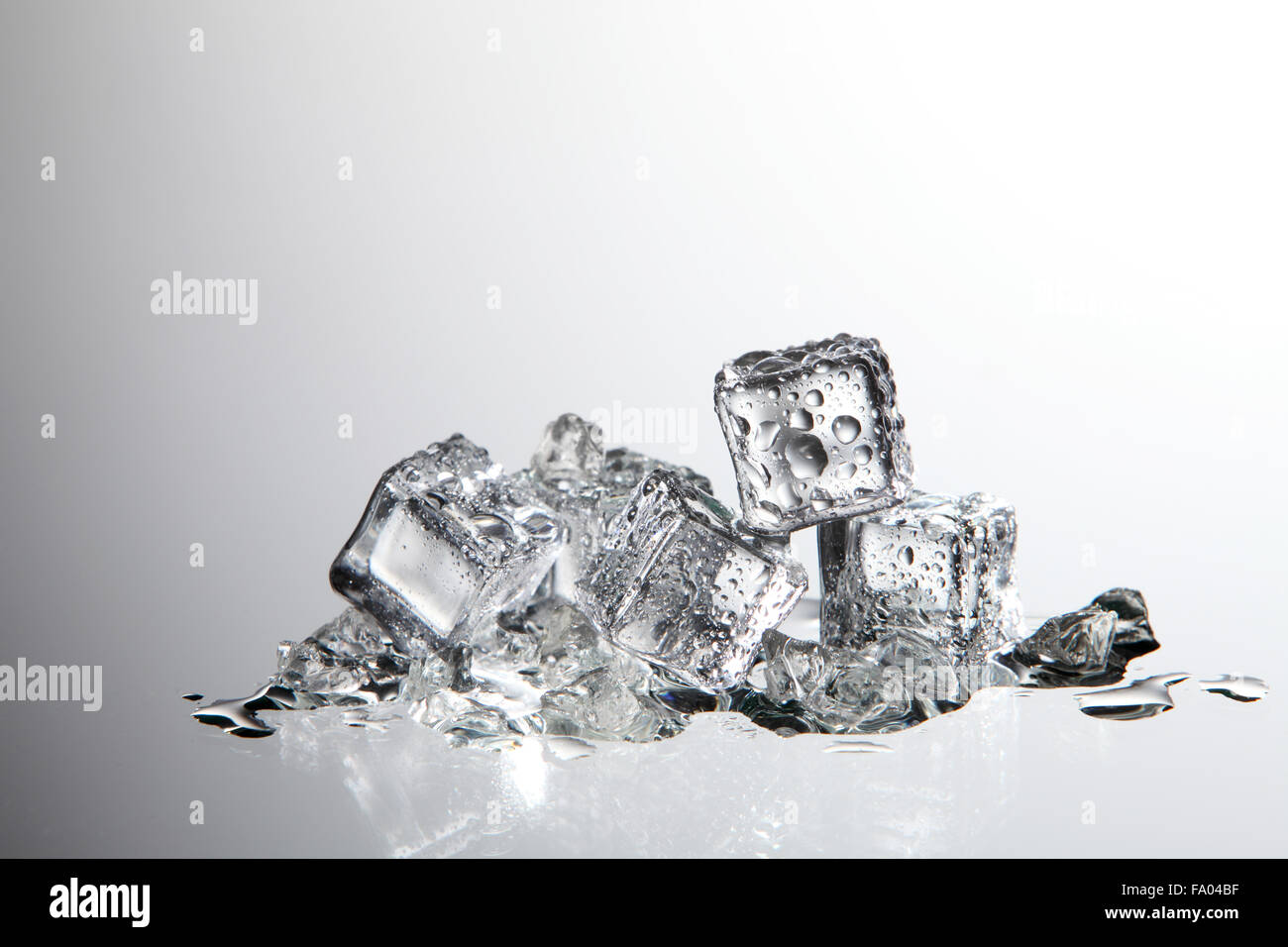 ice cube with water drop on the white background Stock Photo - Alamy