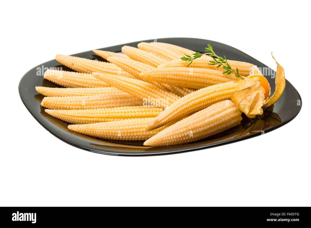 Baby corn isolated Stock Photo - Alamy