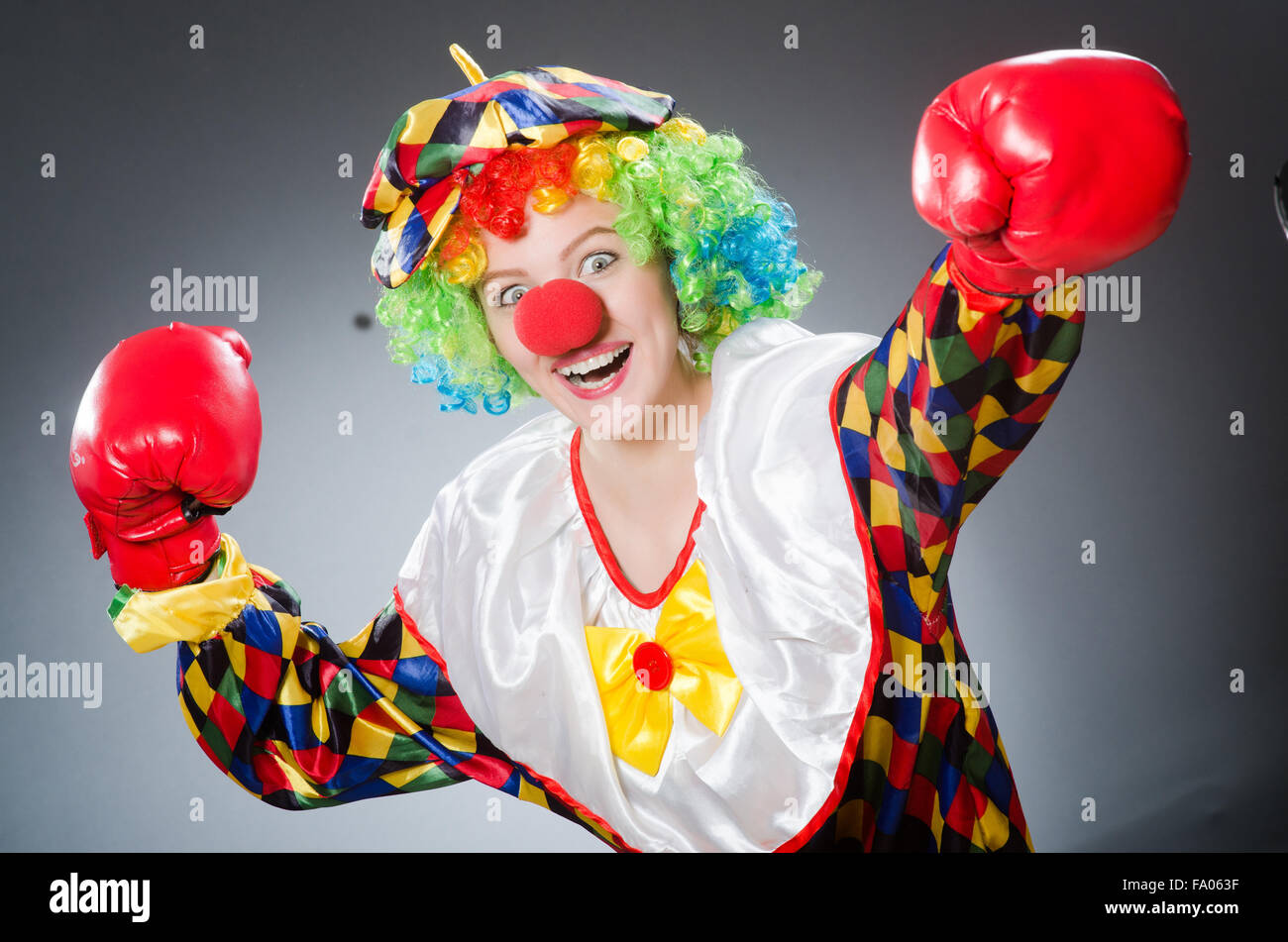 Funny clown with boxing gloves Stock Photo - Alamy
