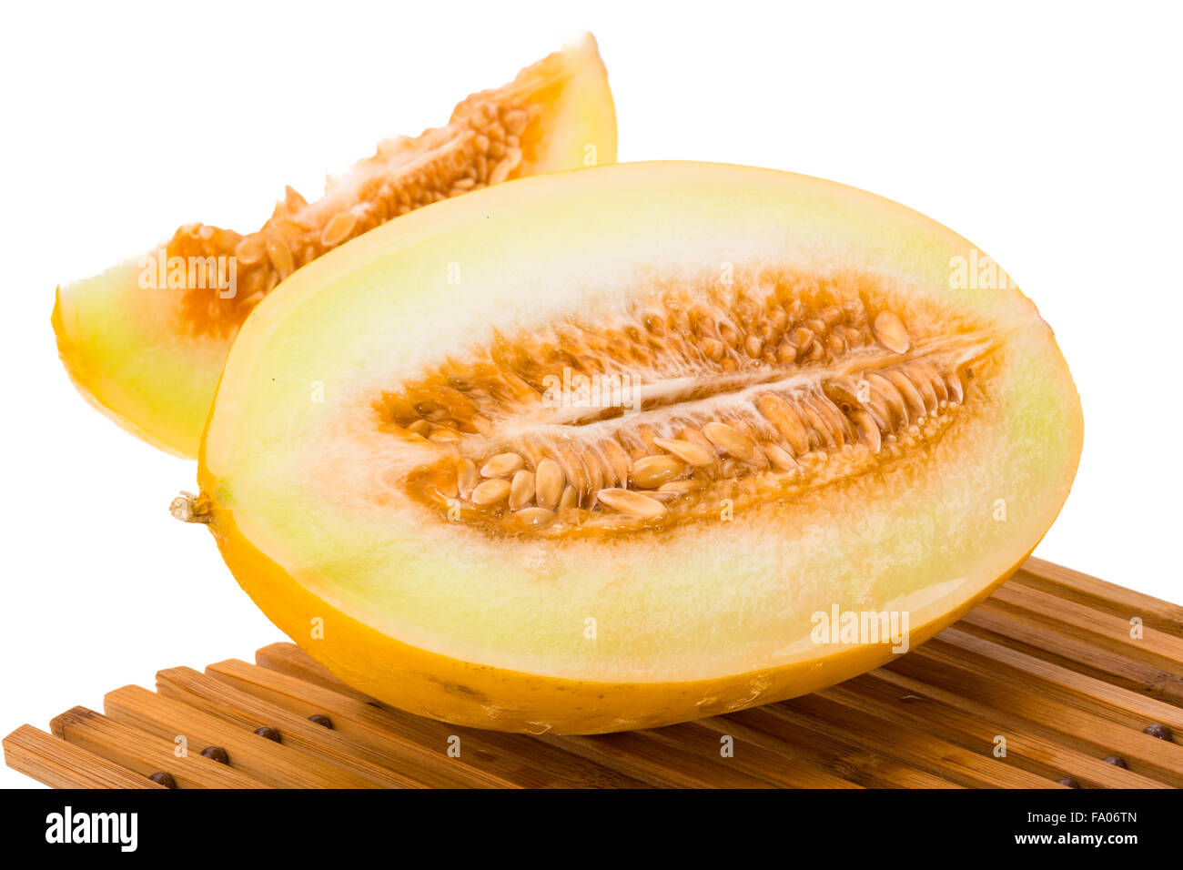 Pipe juicy melon slised macro shoot Stock Photo - Alamy