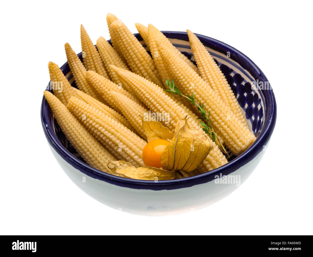 Baby corn with thyme Stock Photo - Alamy