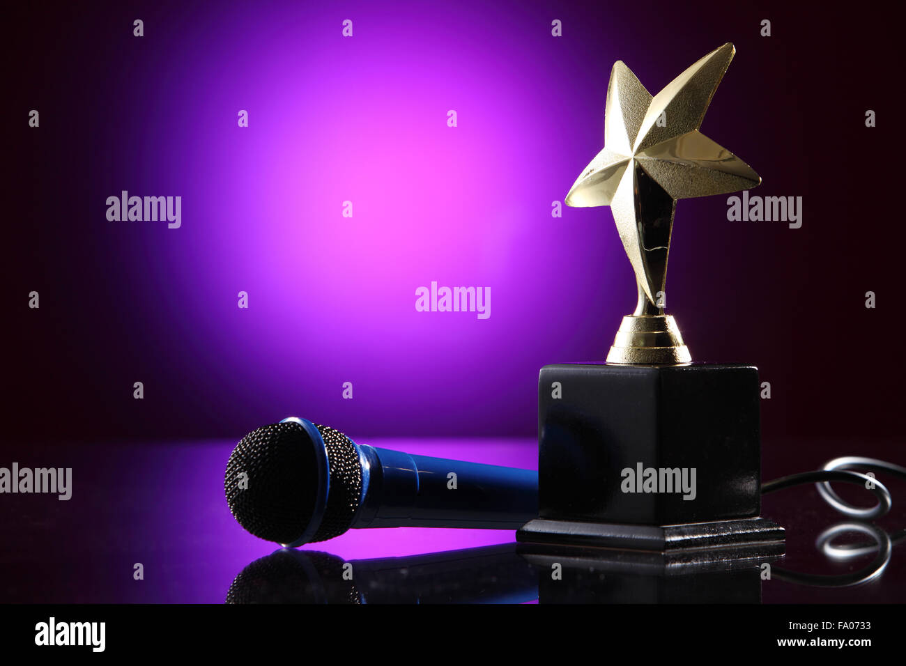 star shape trophy and microphone Stock Photo - Alamy