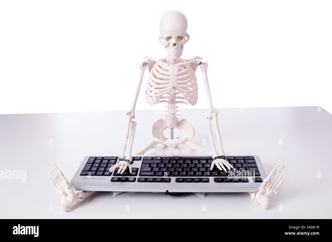 Skeleton Sitting Computer Stock Photos & Skeleton Sitting Computer ...