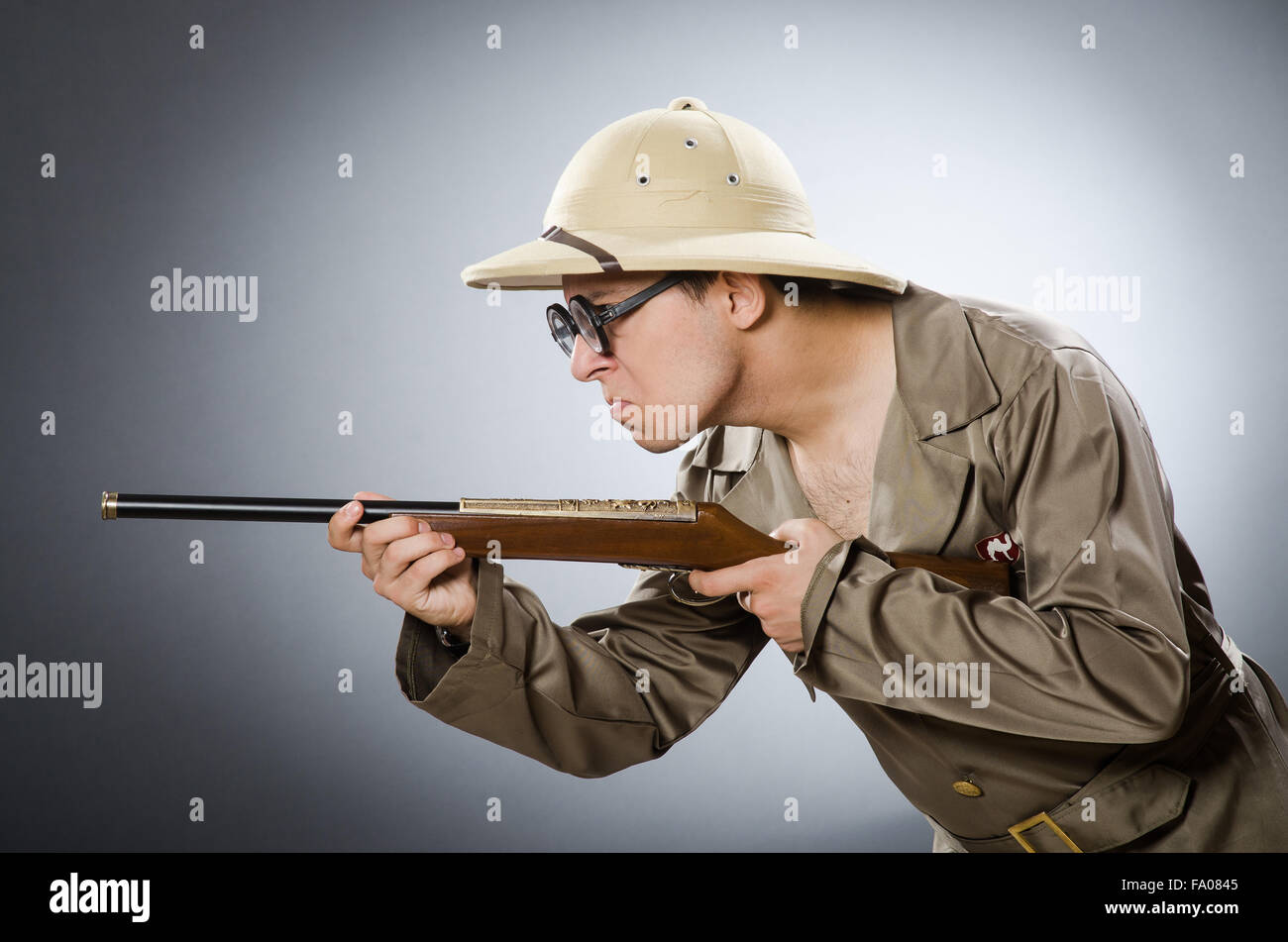 Funny hunter in hunting concept Stock Photo - Alamy