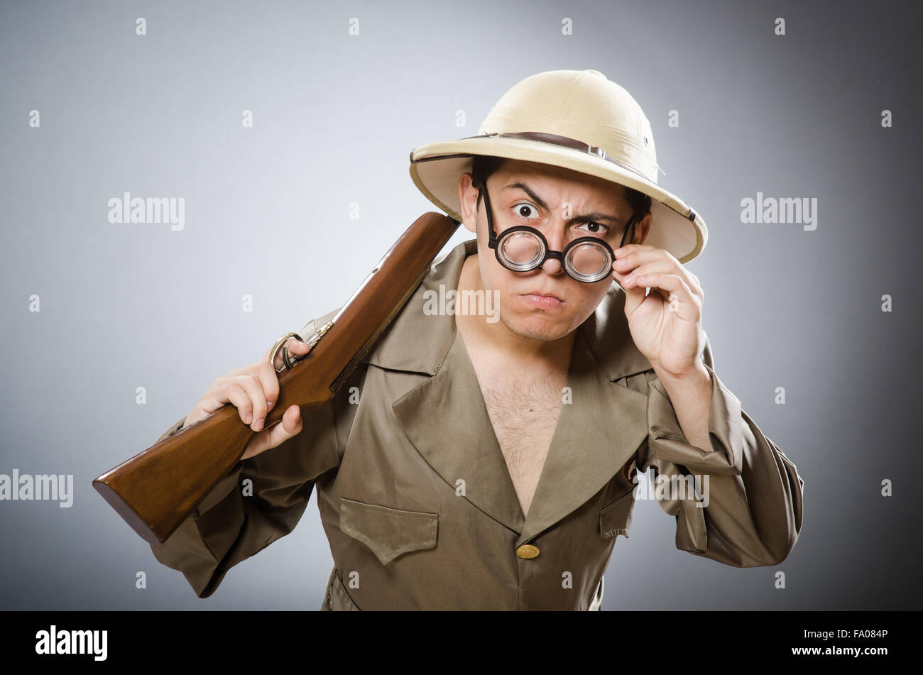 Funny hunter in hunting concept Stock Photo - Alamy