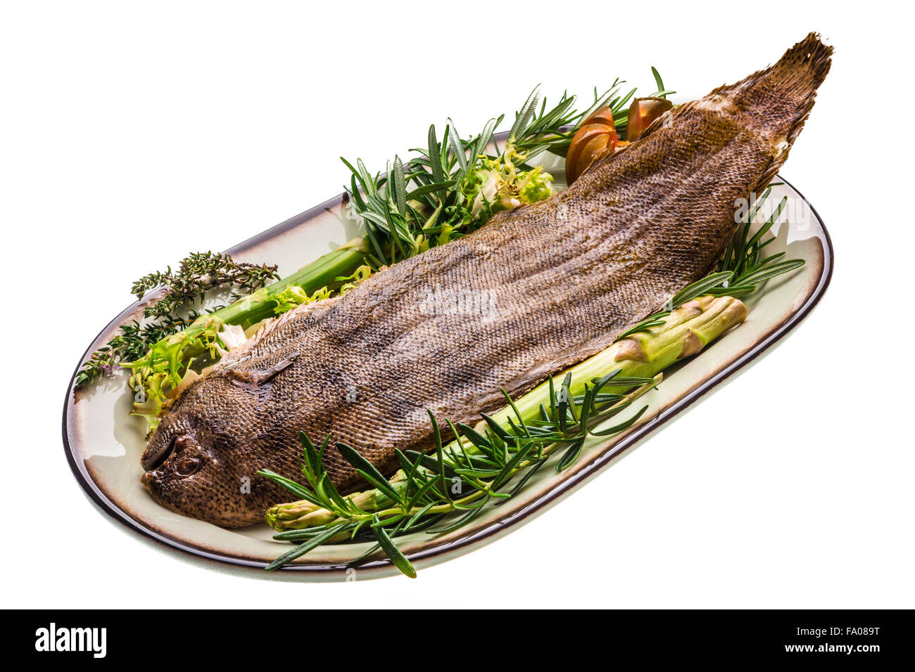 Fish Dover sole roasted Stock Photo - Alamy