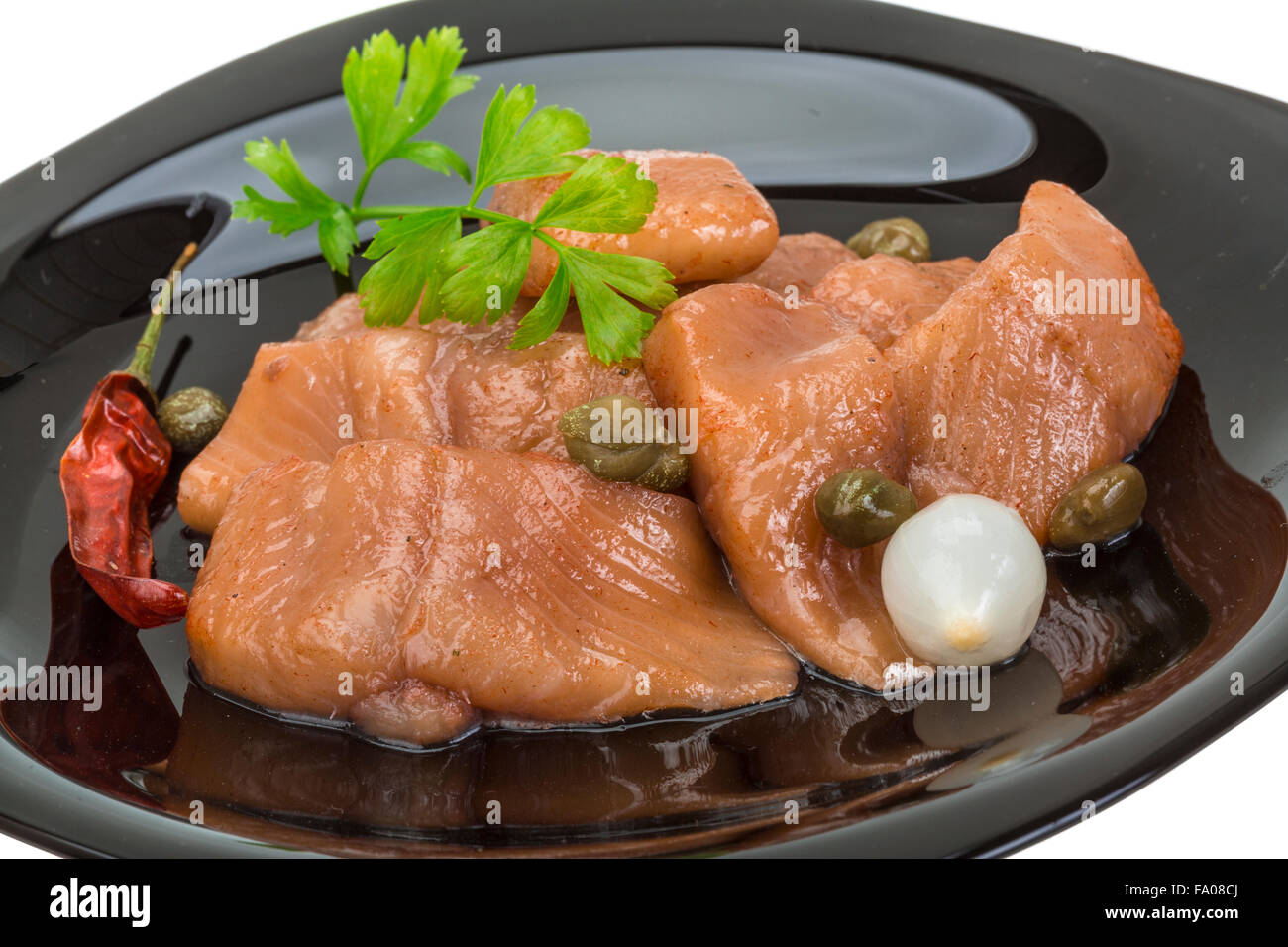 Sliced marinated herring in paprika sauce Stock Photo - Alamy