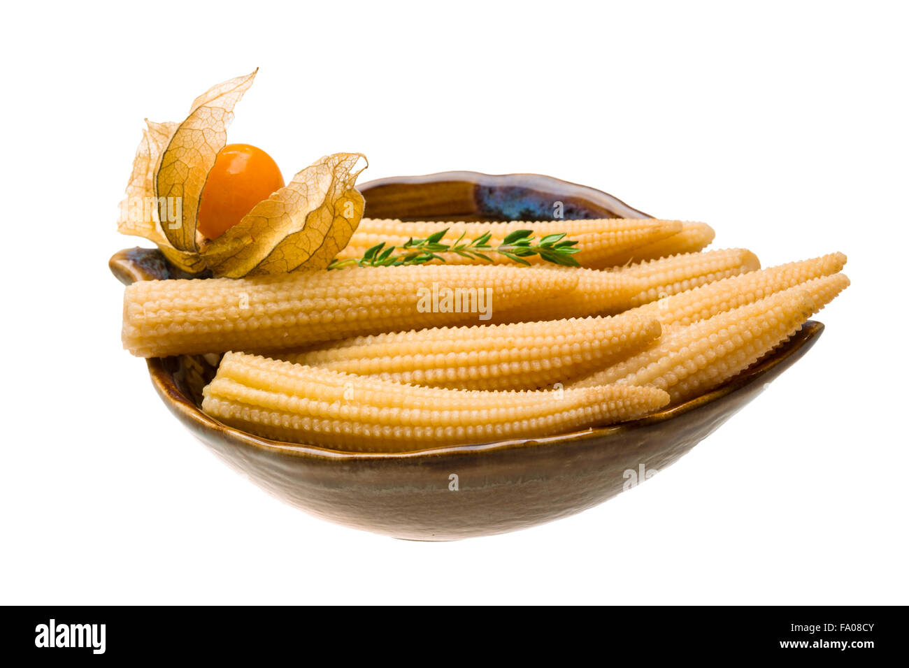 Baby corn with thyme Stock Photo - Alamy