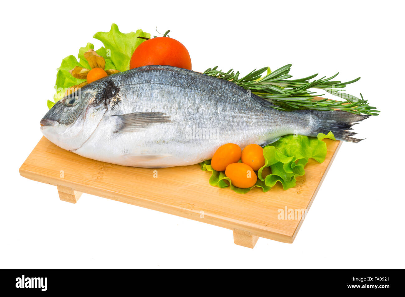 Raw dorado with herbs Stock Photo - Alamy
