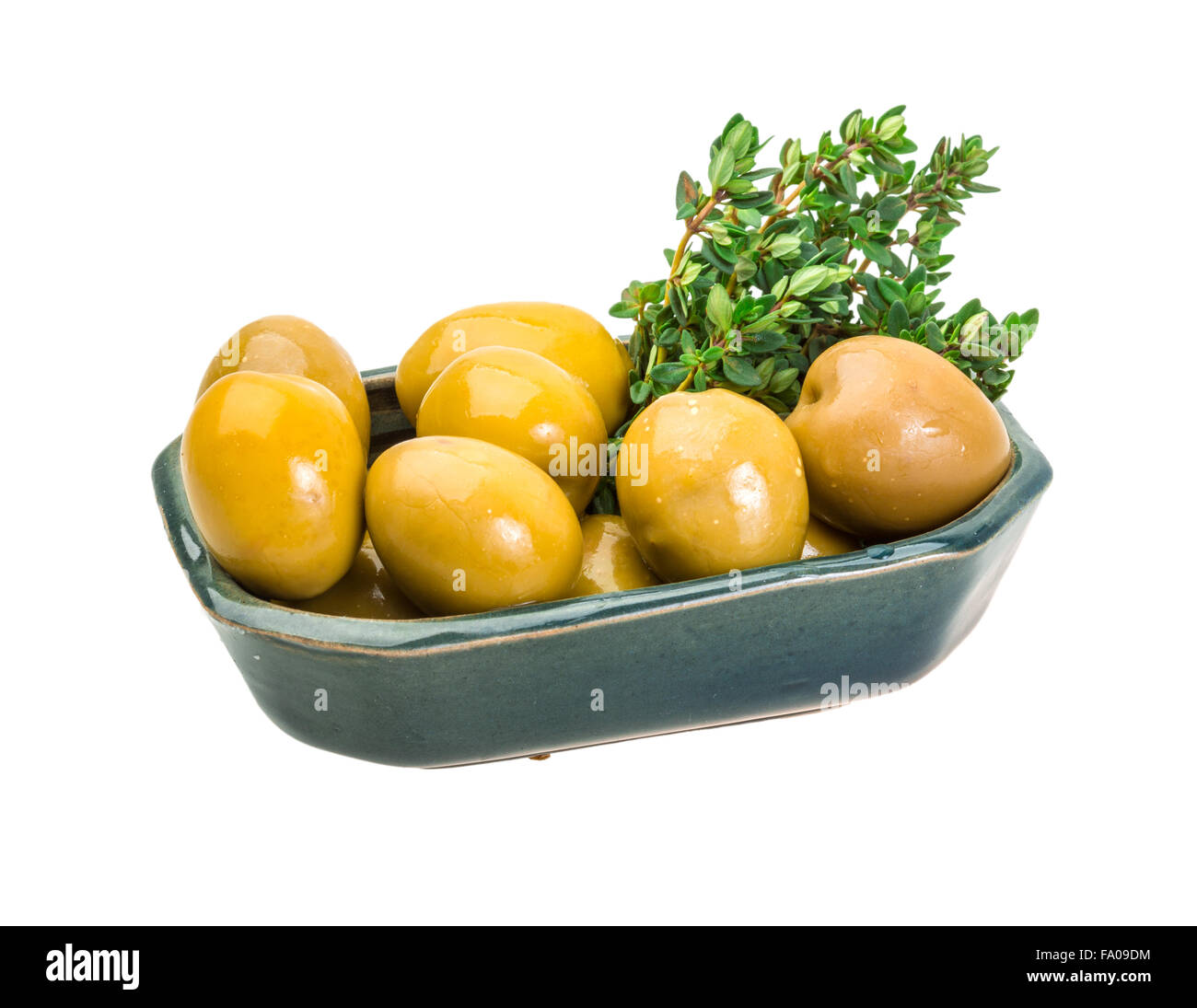 Green gigant olives with thyme Stock Photo - Alamy