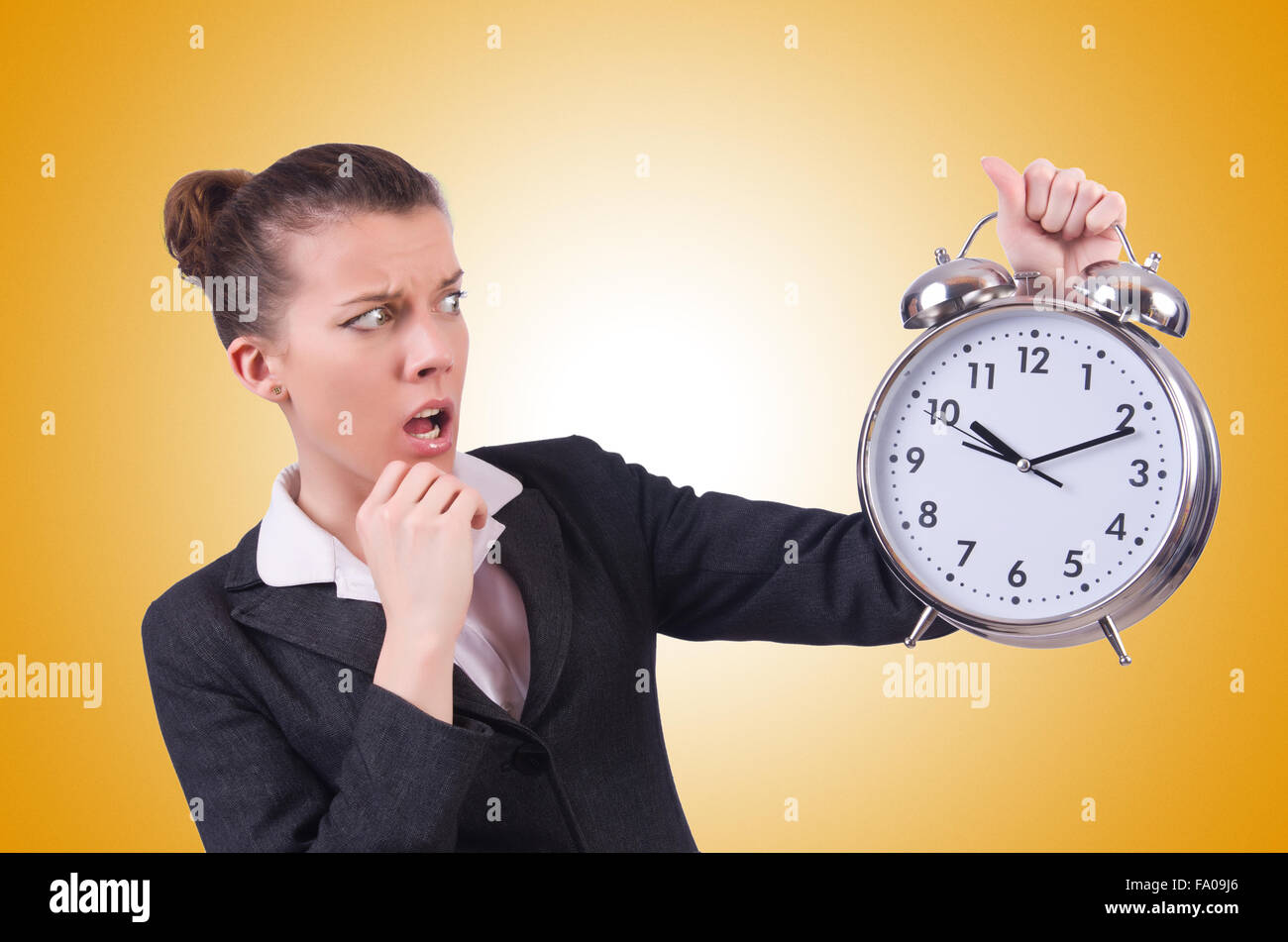 Woman with giant clock on white Stock Photo - Alamy