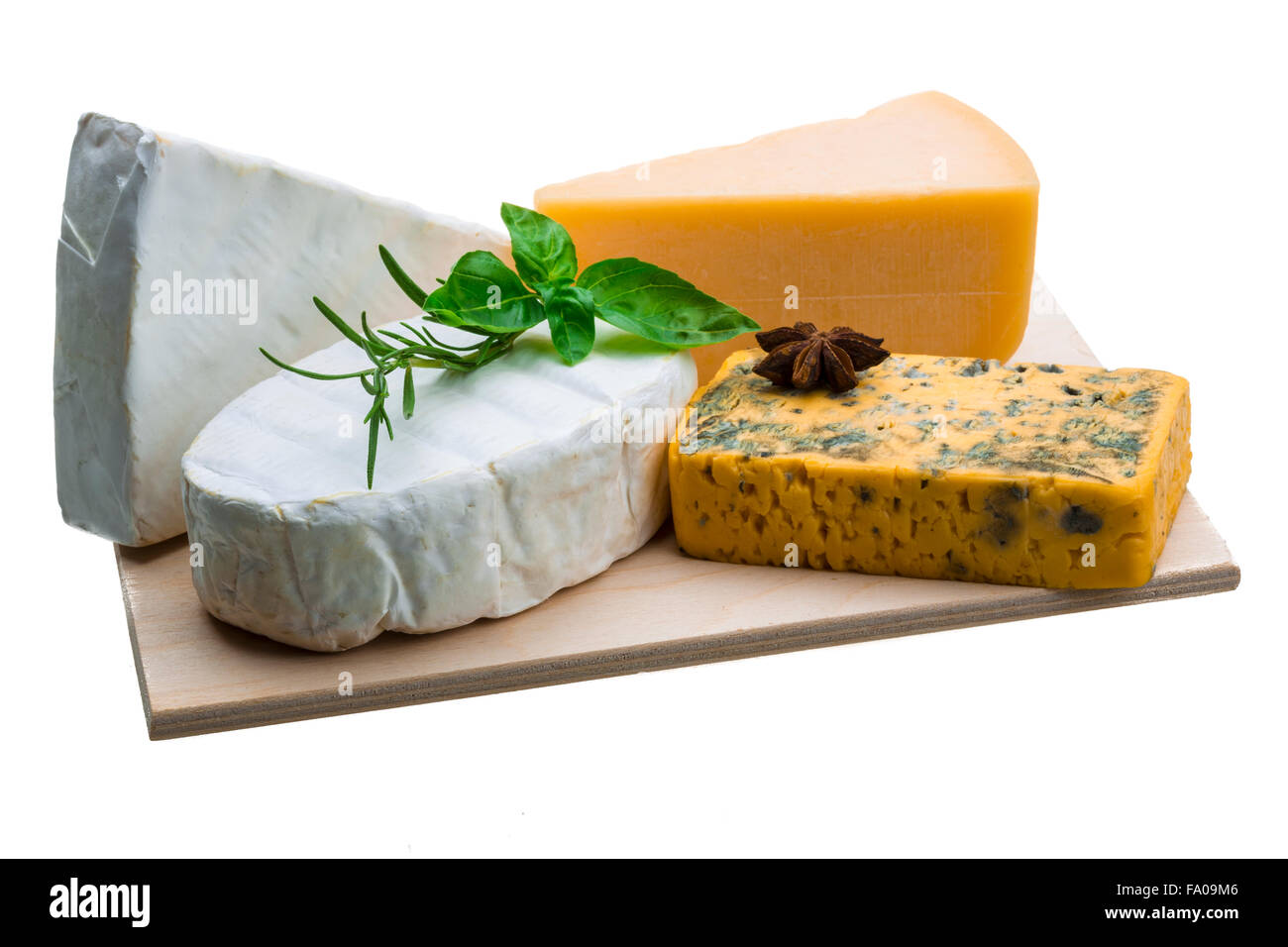 Variety cheese assortment with nuts and herbs Stock Photo - Alamy