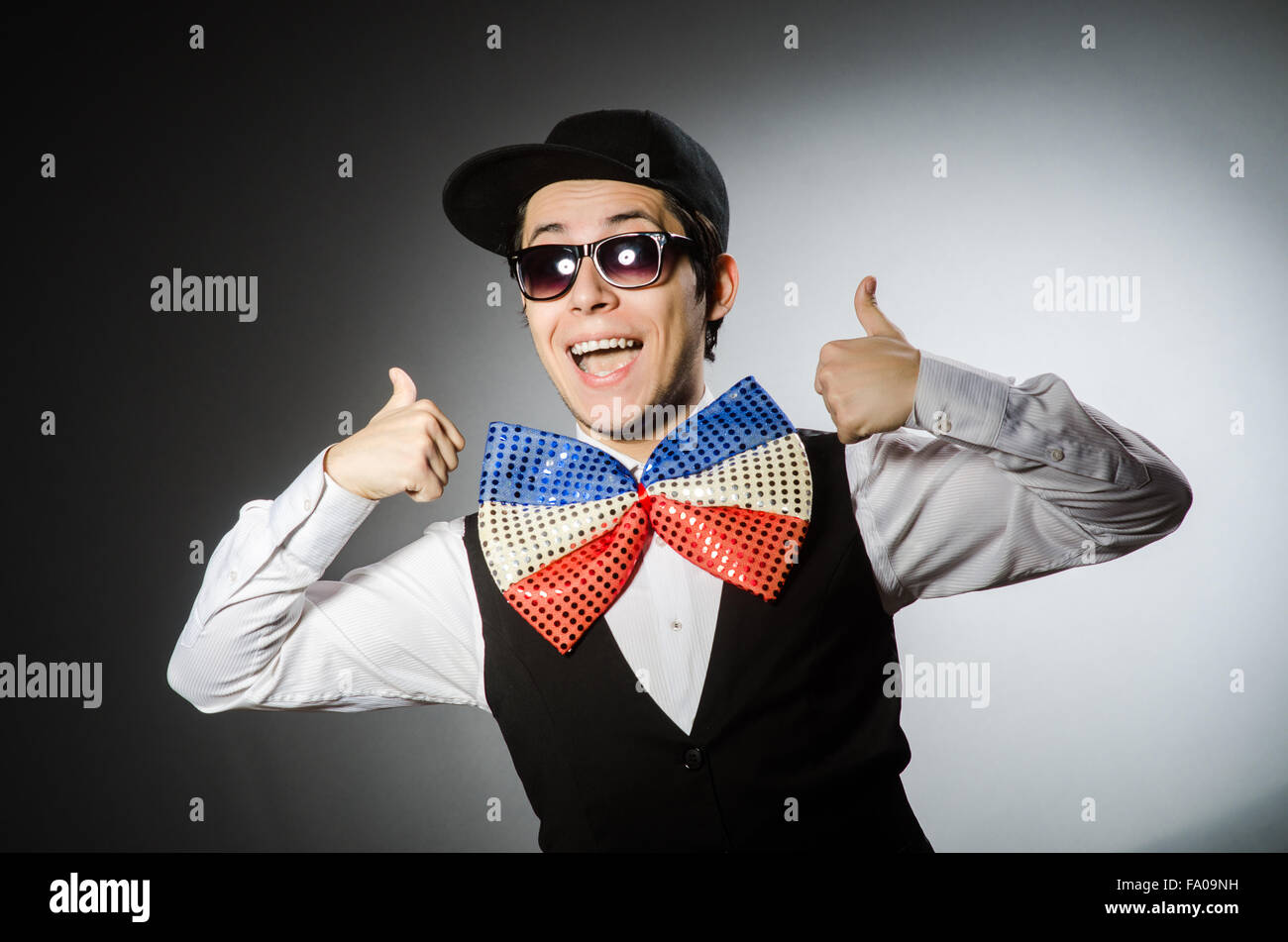Funny man with giant bow tie Stock Photo - Alamy